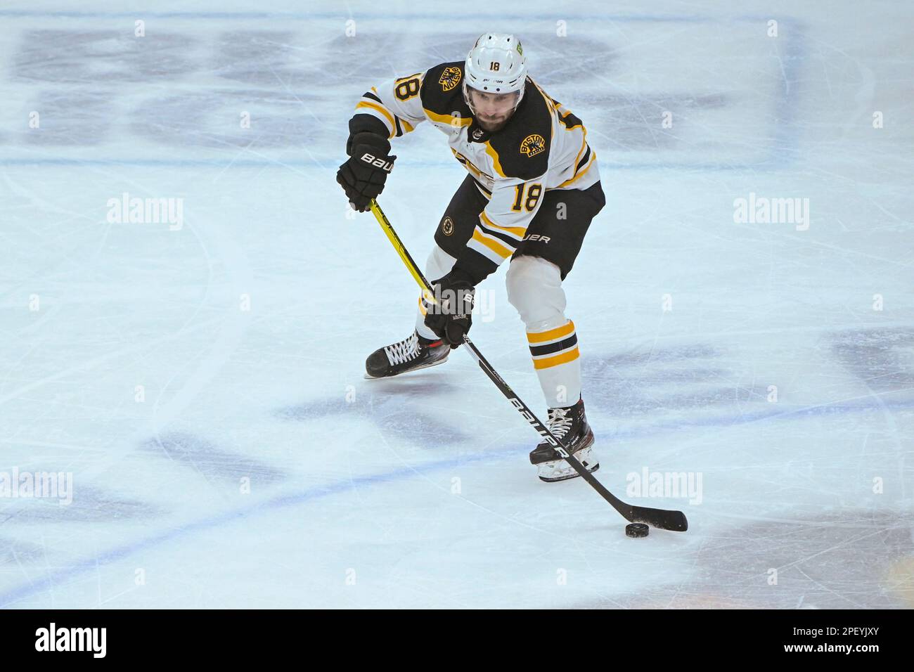 Boston Bruins center Pavel Zacha (18) moves the puck against the ...