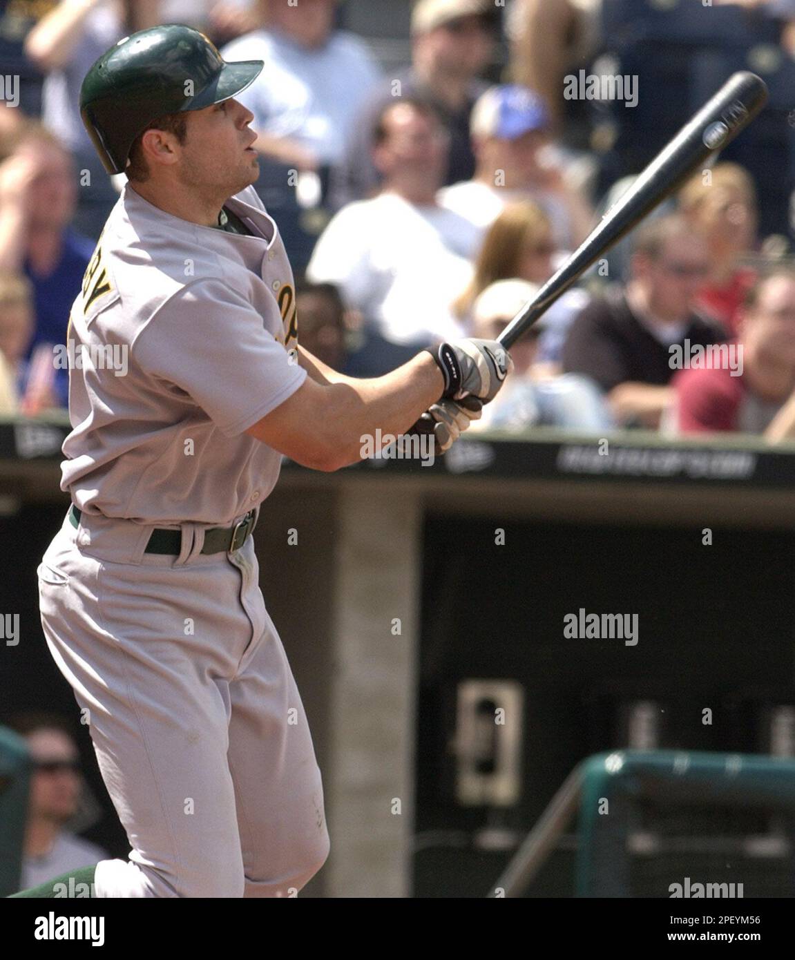 Oakland Athletics' Bobby Crosby hits a single to drive in Damian Miller ...