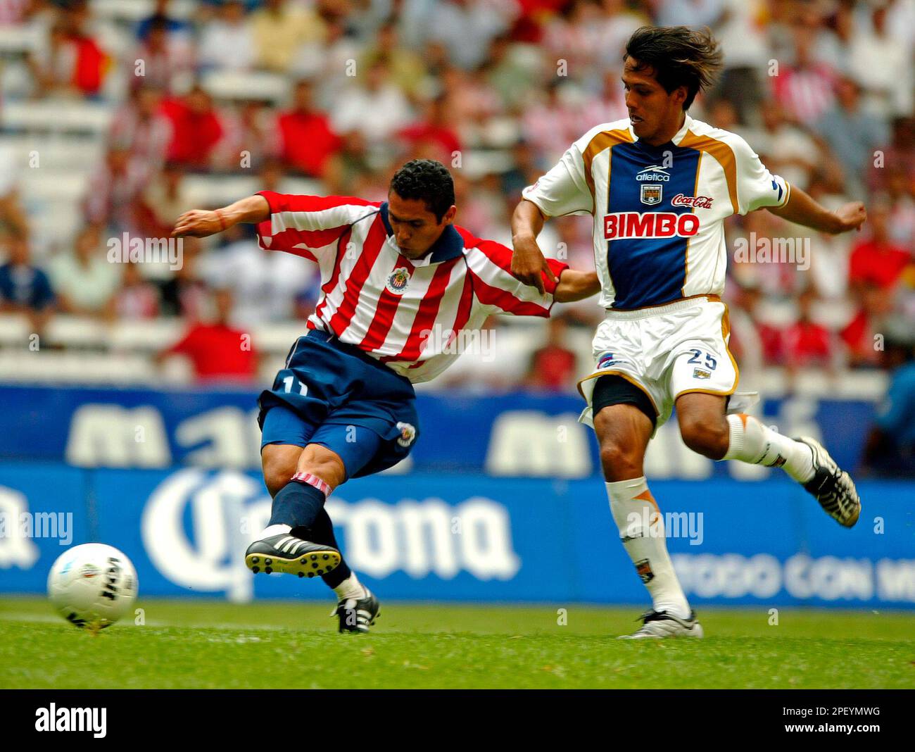 Chivas player Ramon Morales, left, kicks the ball to score Chivas ...