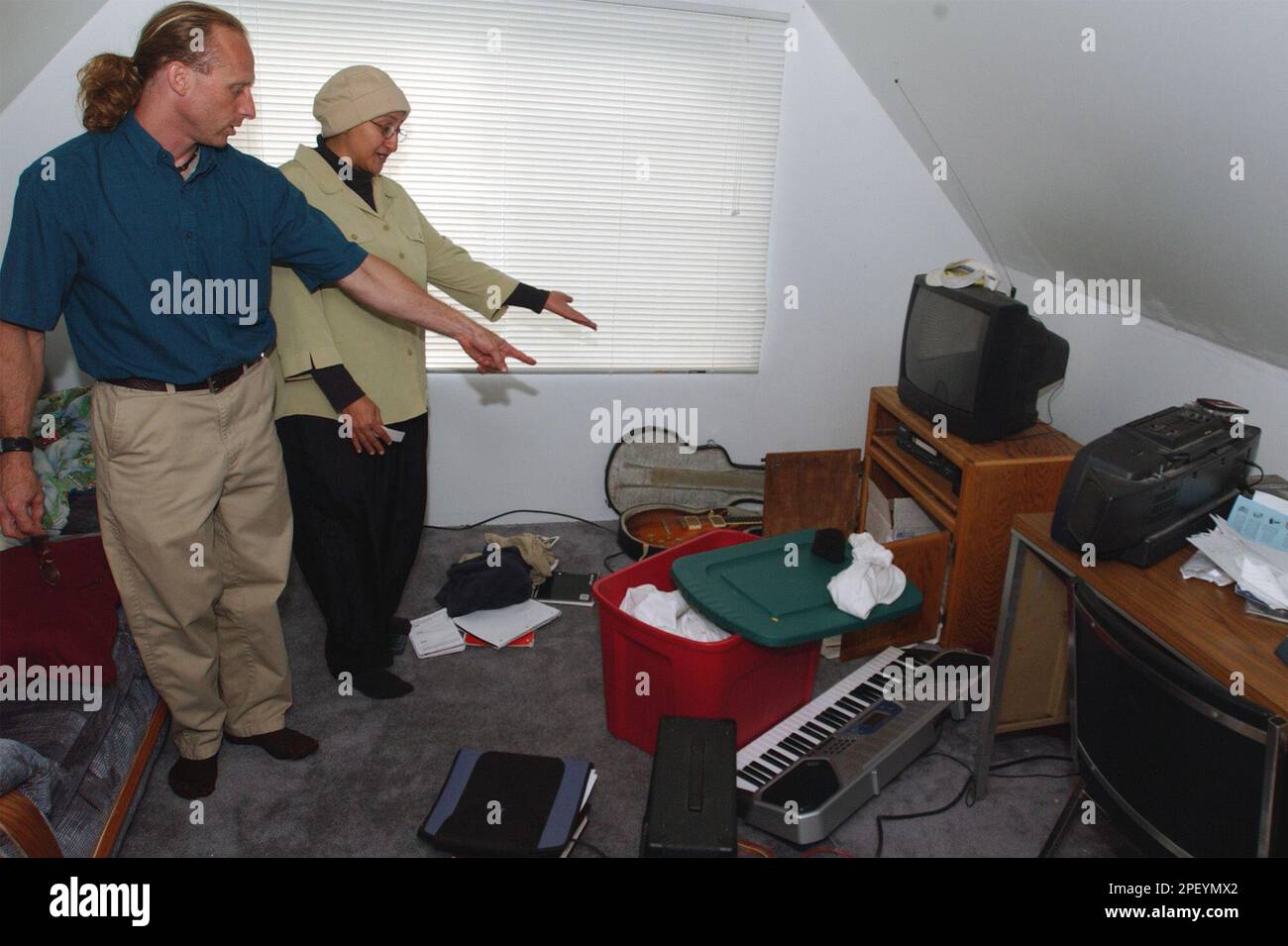 Kent Mayfield, left, and Mona Mayfield, brother and wife of Brandon ...