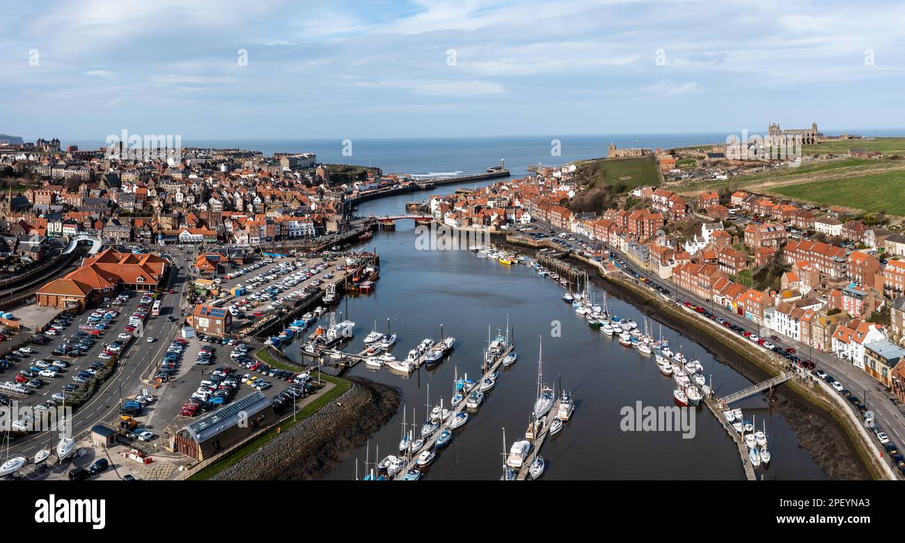 WHITBY, UK - MARCH 12, 2023. An aerial landscape of the harbour and ...