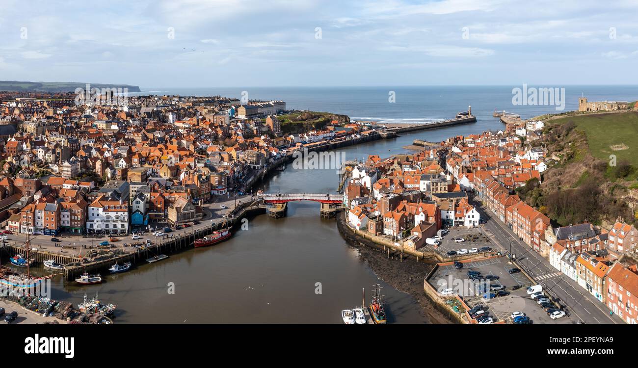 WHITBY, UK - MARCH 12, 2023. An aerial landscape of the harbour and ...