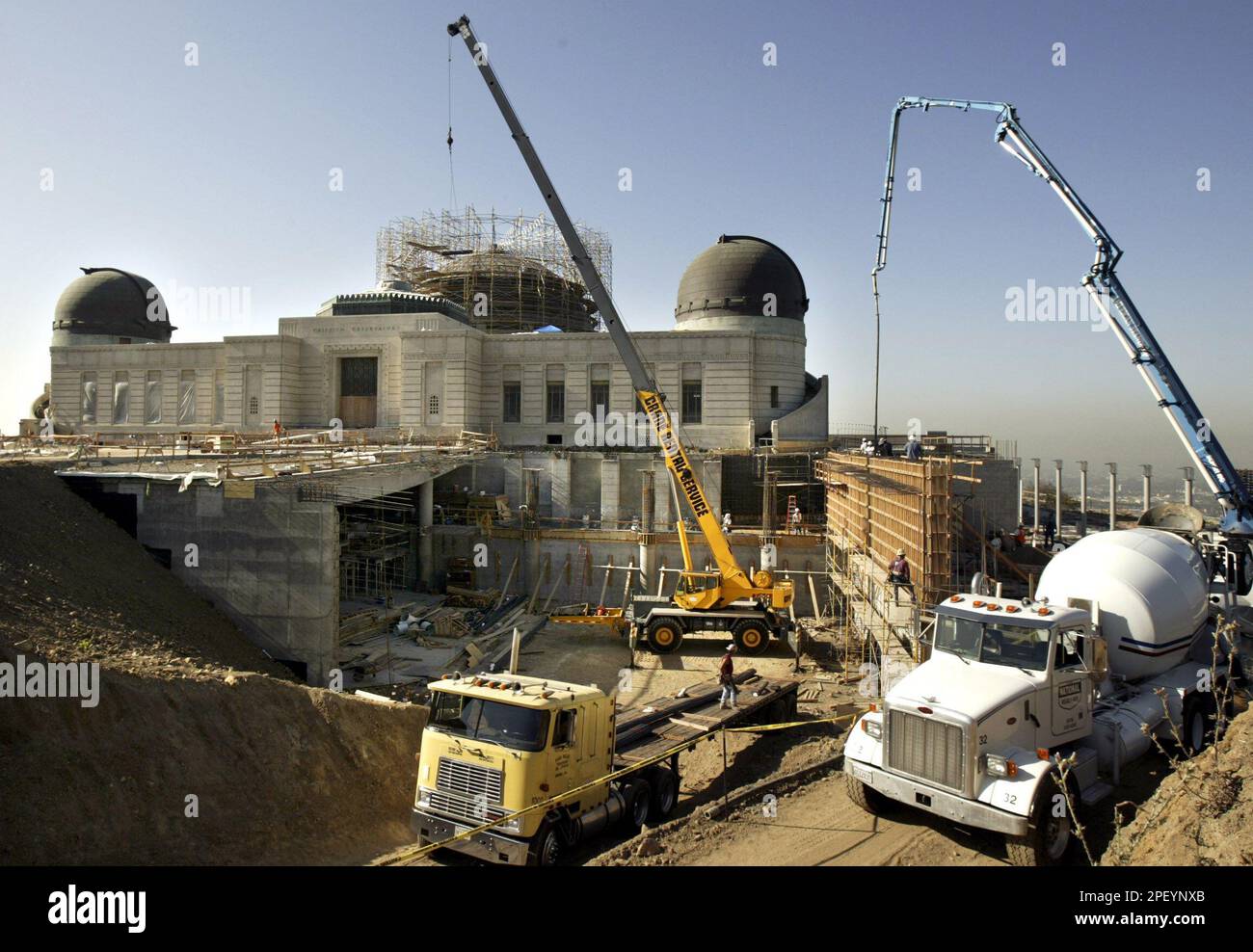 Scaffolding covers the copper-clad dome above the entrance to Griffith ...