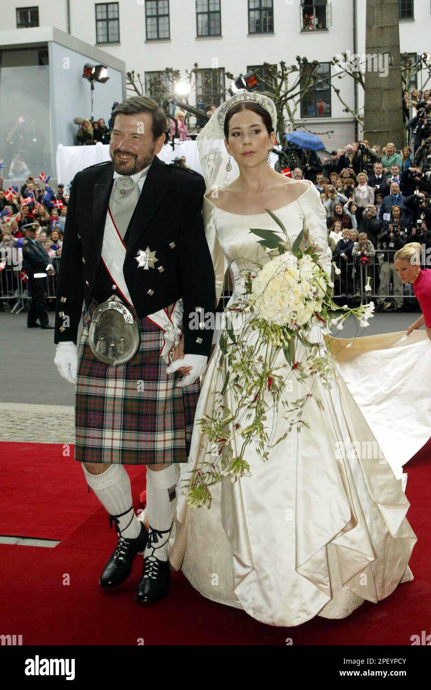Mary Donaldson, fiancee of Denmark's Crown Prince Frederik, is escorted ...