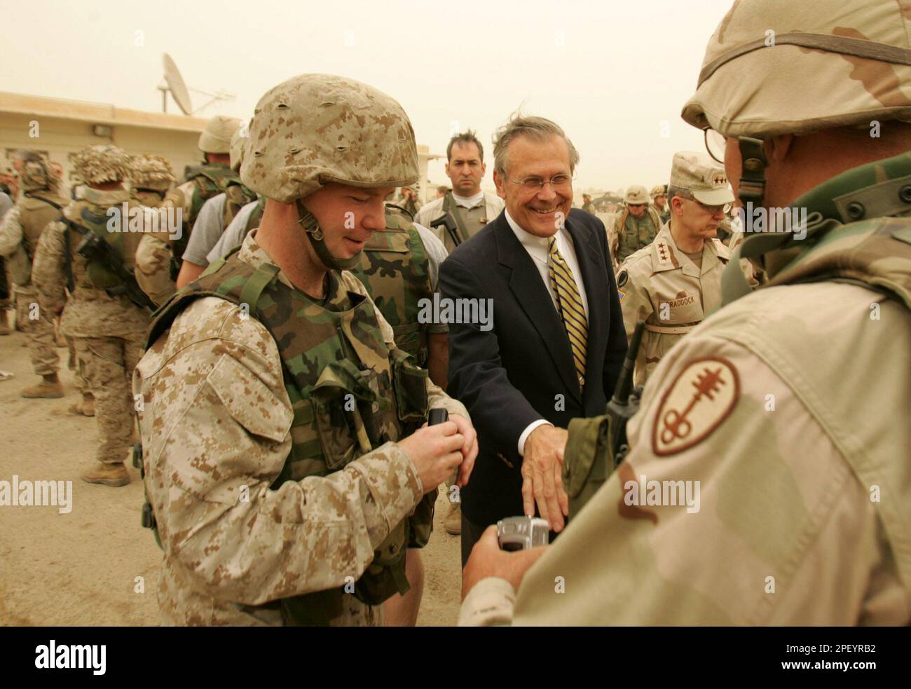 U.S.Defense Secretary Donald H. Rumsfeld, center, greets U.S. Army ...