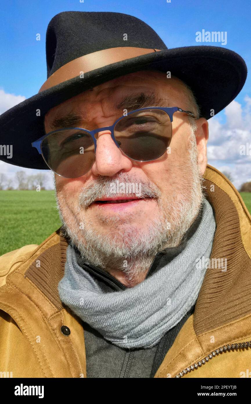 Portrait Of Old Man With Hat Stock Photo - Alamy