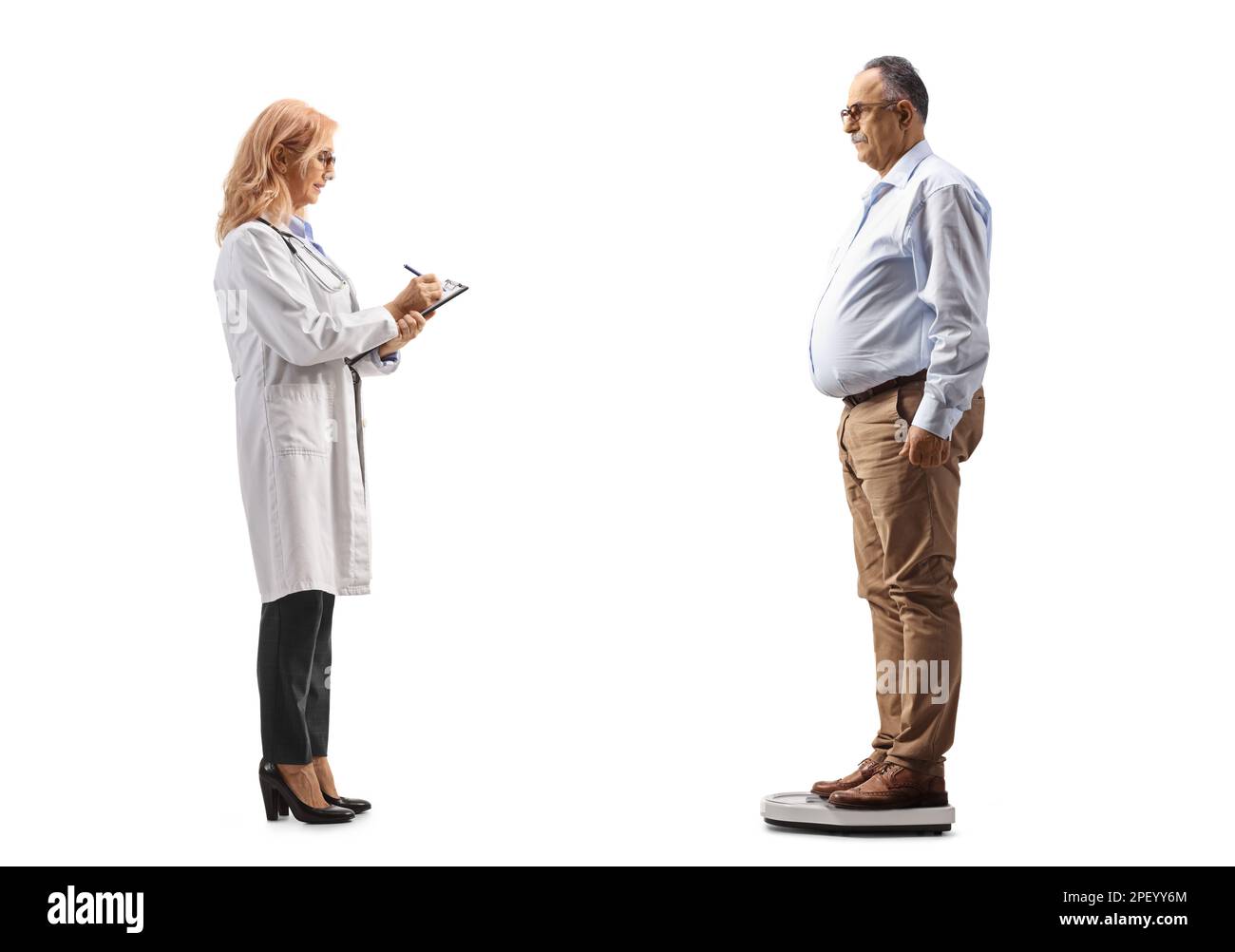Full length profile shot of a female doctor checking weight of a mature ...