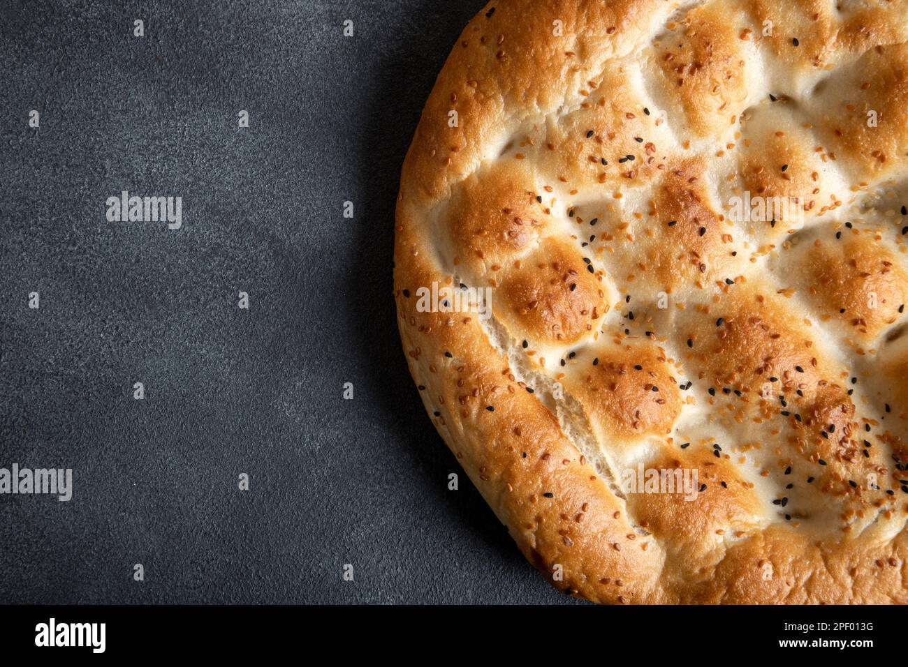 Traditional Ramadan pita on black background.Holy bread for Muslims ...
