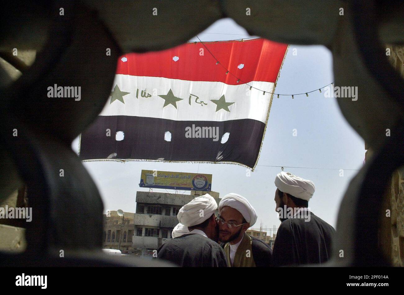 Iraqi Sunnis greet each other before Friday prayers, for the first time ...