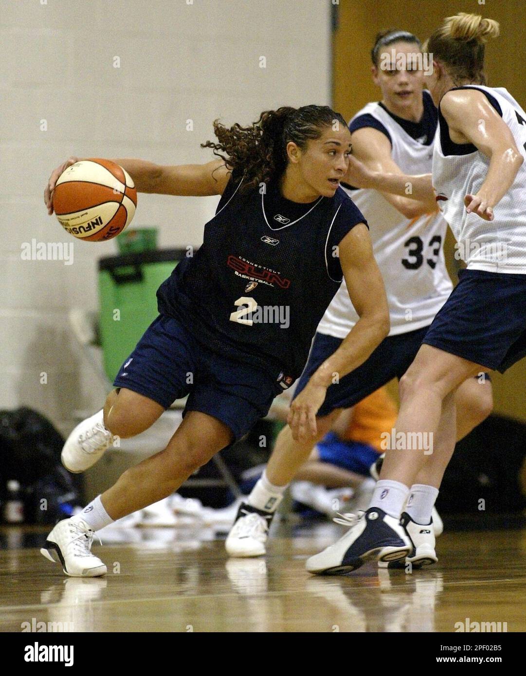 Connecticut Sun's Brianne Stepherson (2) drives toward the basket ...
