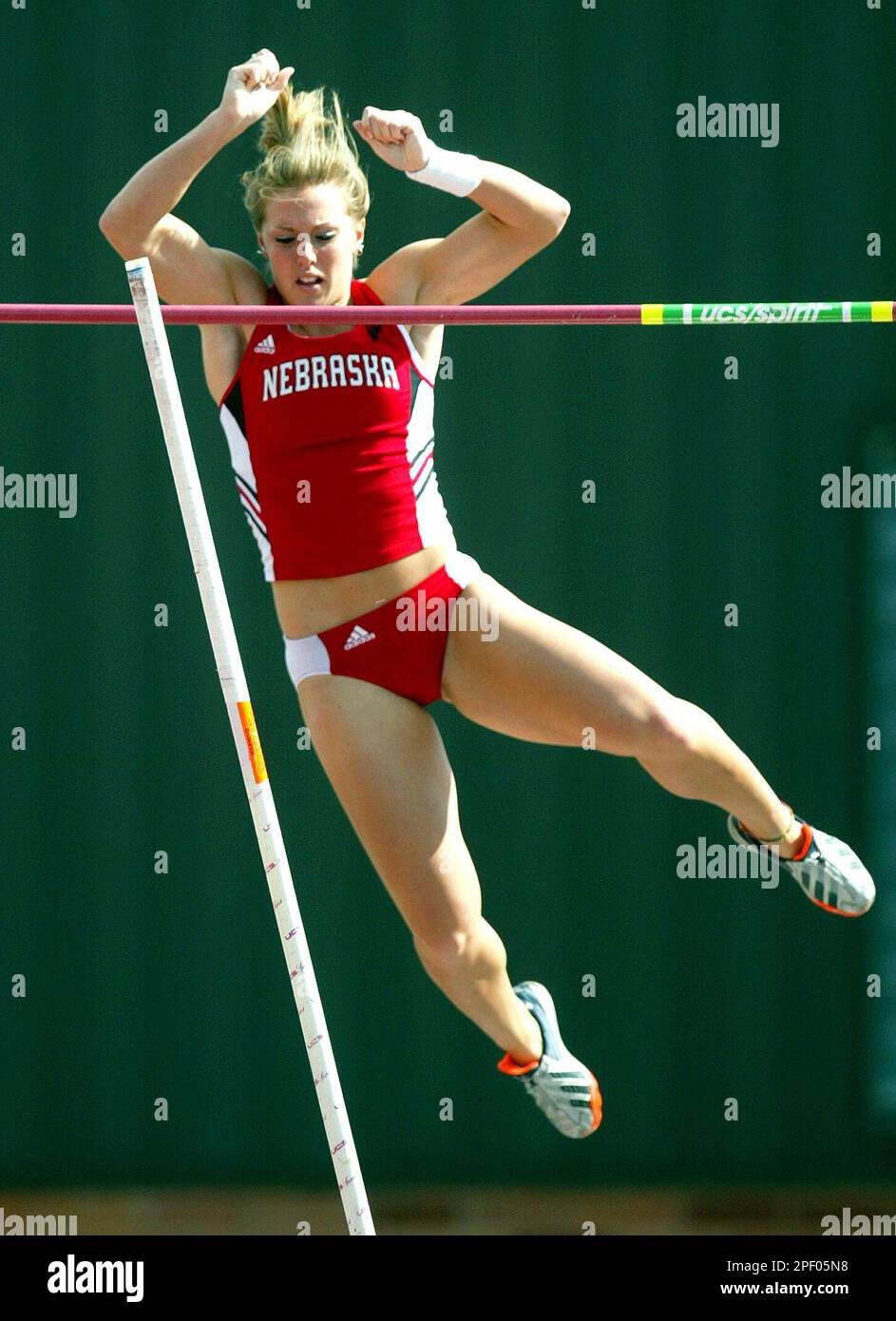 Nebraska's Jenny Green clears the bar as she competes in the women's ...