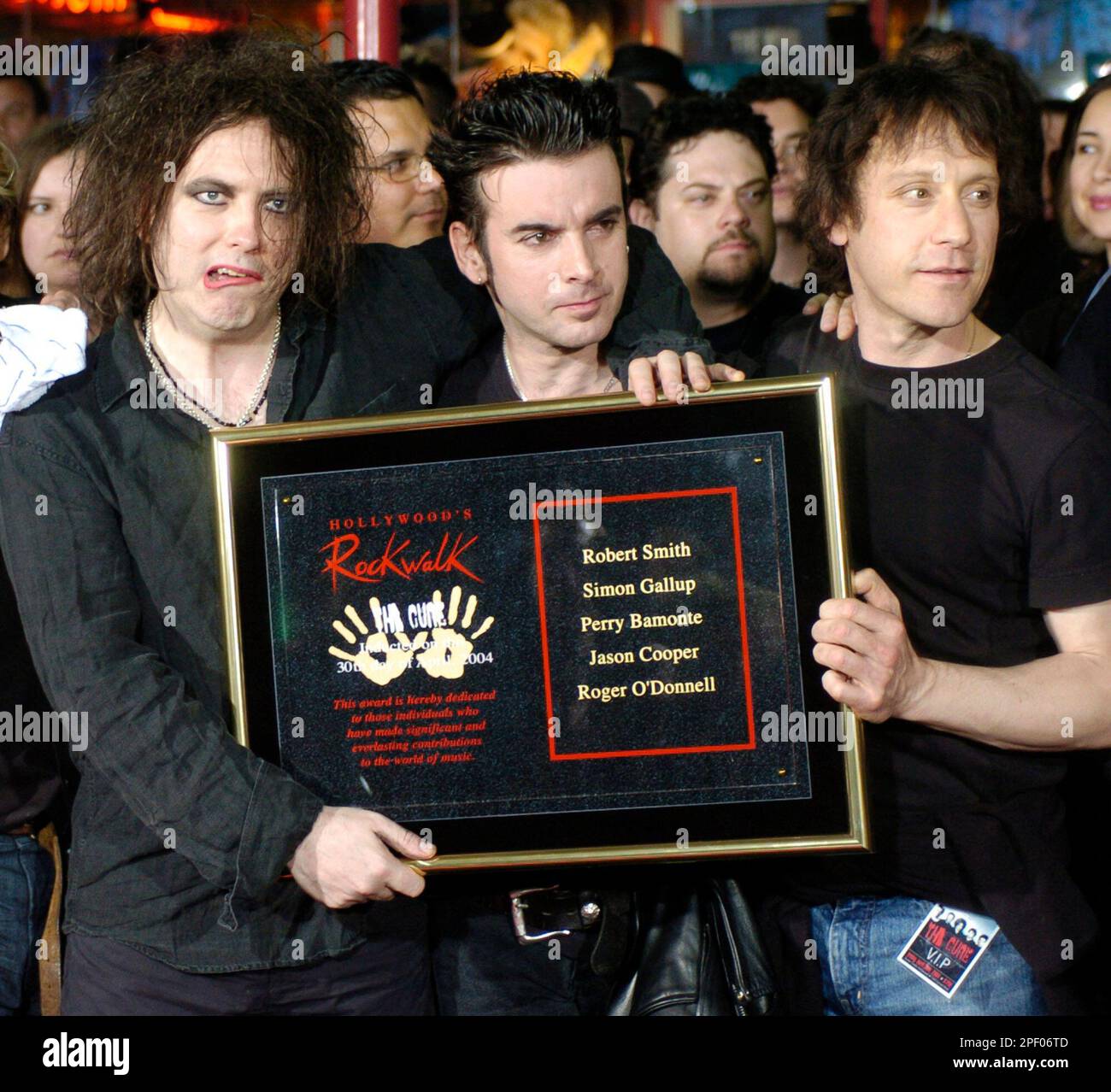 Robert Smith, left, Simon Gallup, center, and Perry Bamonte of British ...