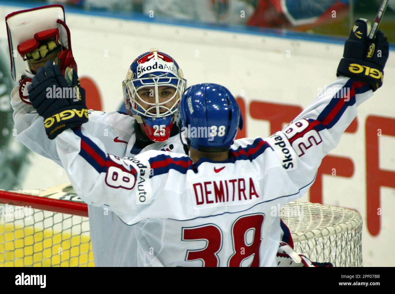 Slovakia's goalkeeper Jan Lasak, left, and his teammate Pavol Demitra ...