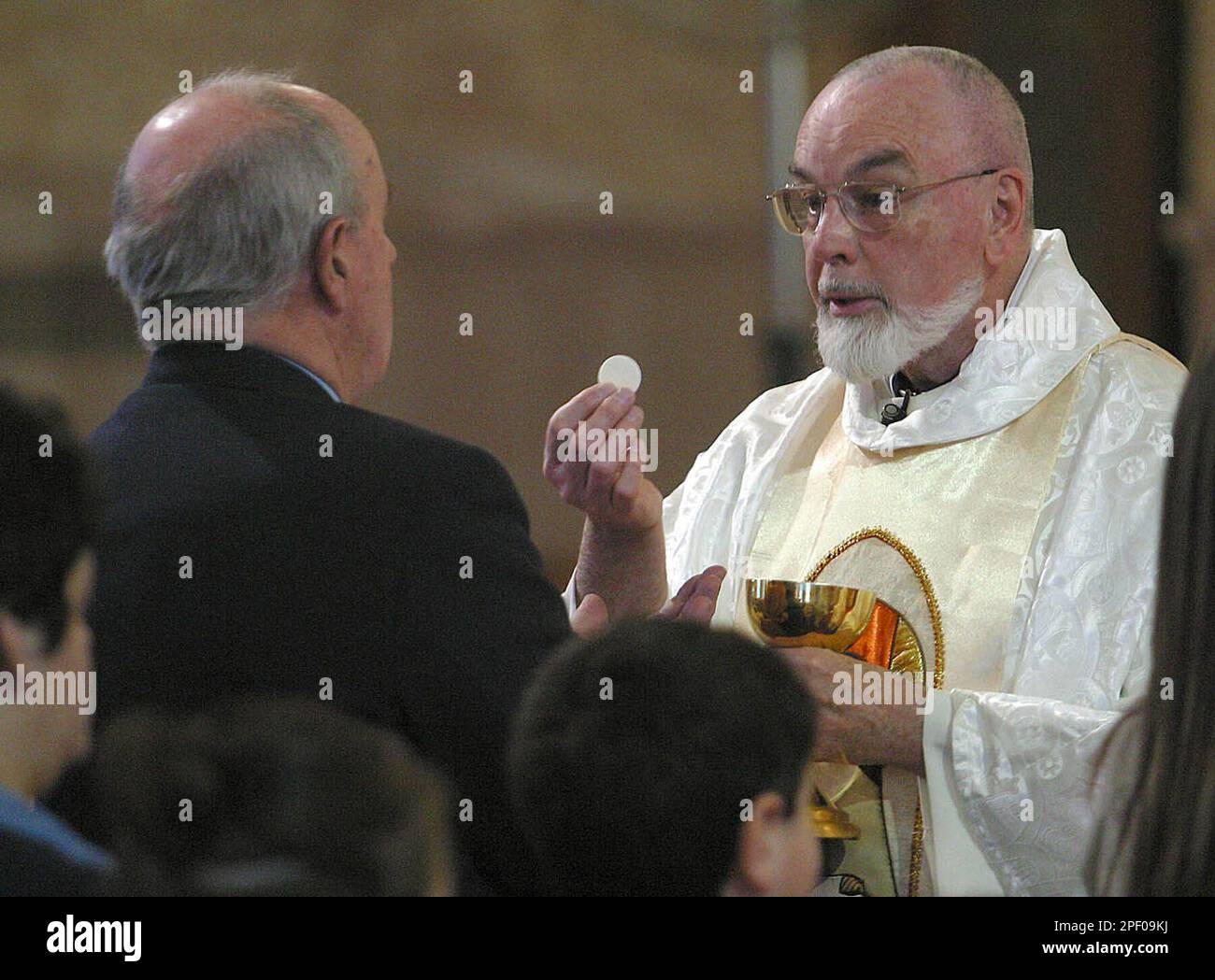 Rev. Samuel Leonard celebrates communion for the first time as an ...