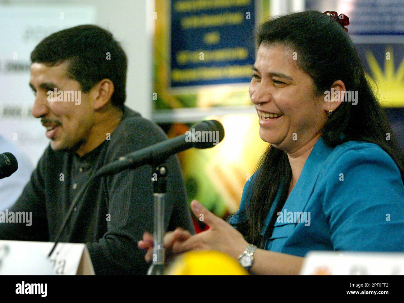 Lottery jackpot winners Maria Bonilla, right, and Miguel Bonilla, left ...