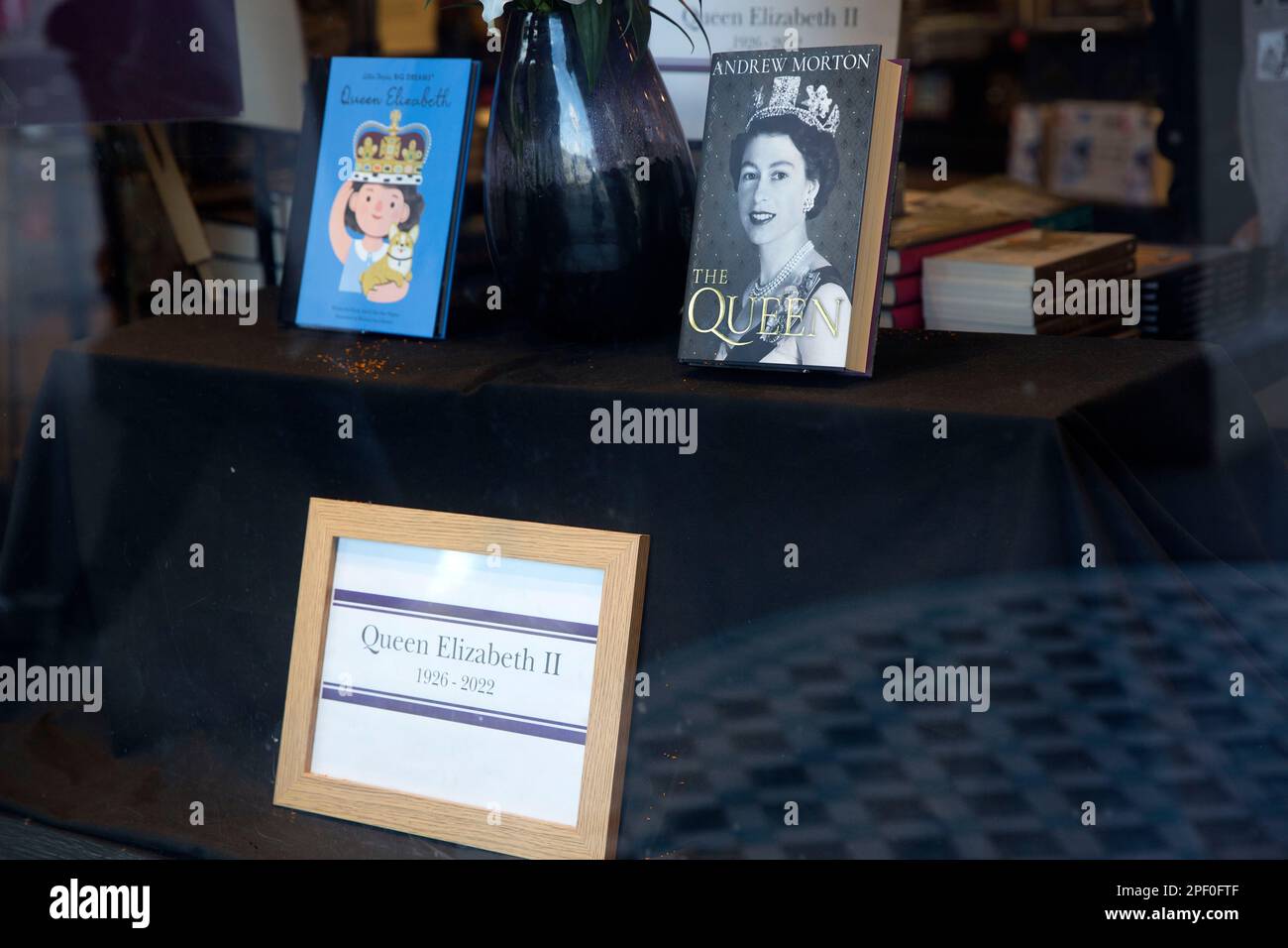 An image of the late Queen Elizabeth II is displayed at a shop in ...