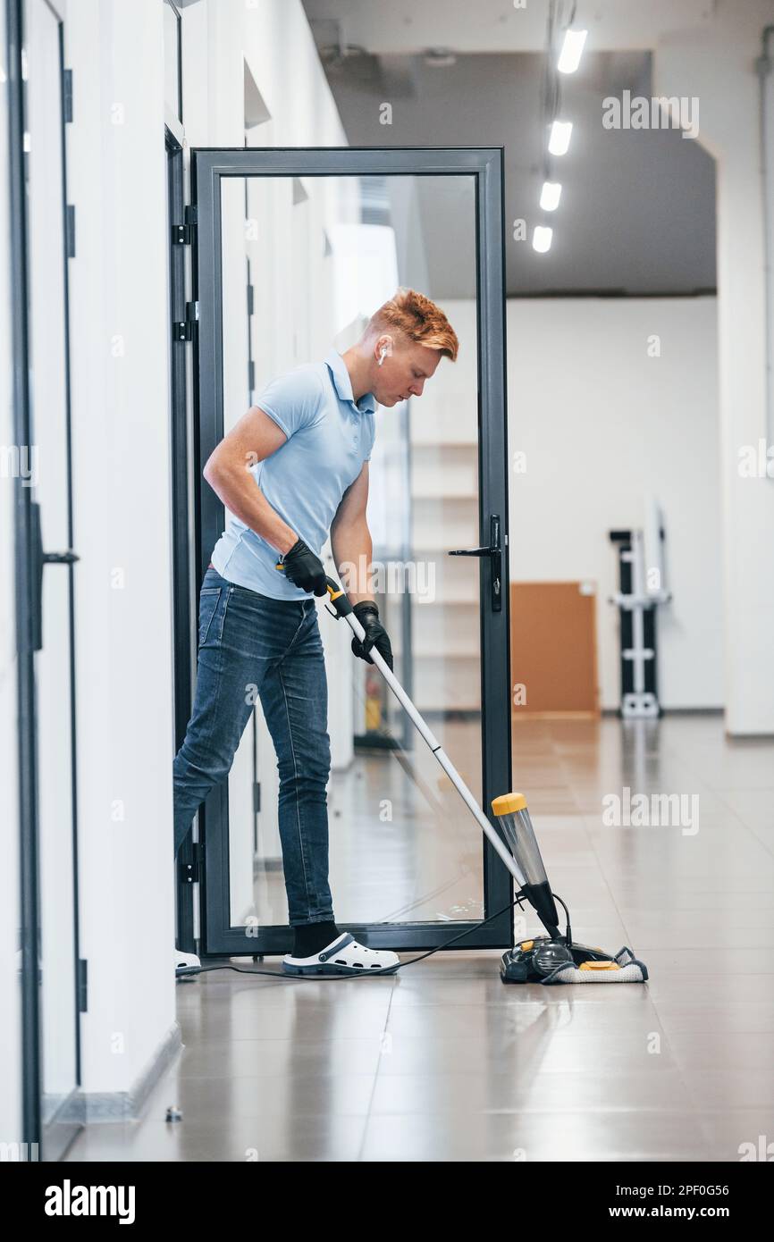 Person uses vacuum cleaner hi-res stock photography and images - Alamy