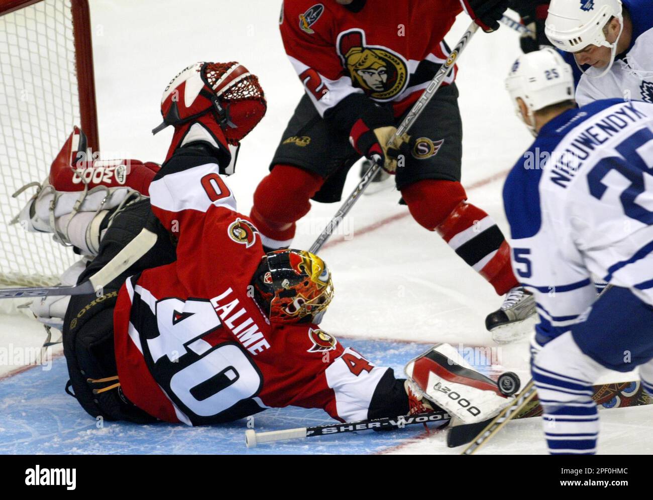 Ottawa Senators goalie Patrick Lalime makes the save on Toronto Maple ...
