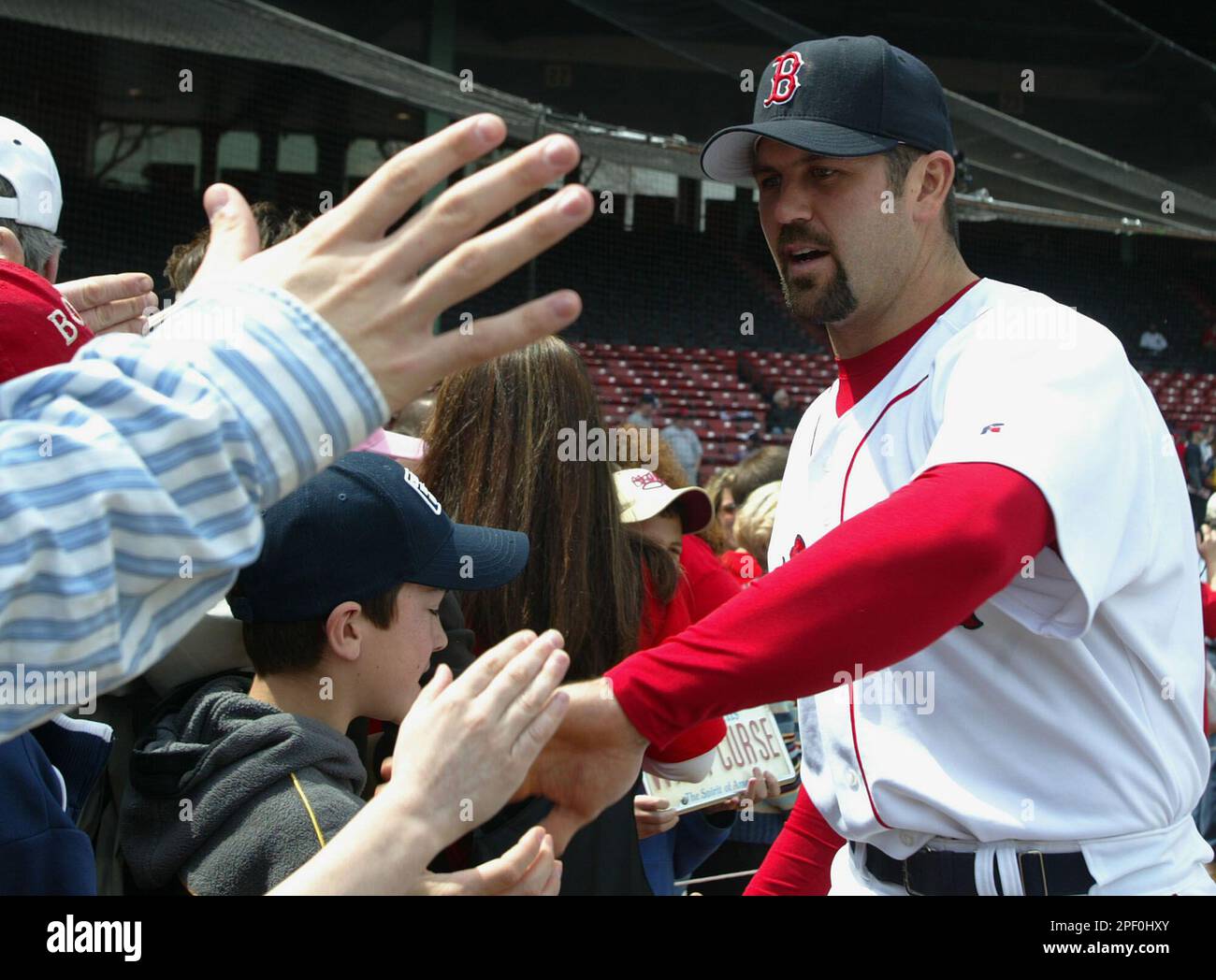 Boston Red Sox catcher Jason Varitek greets fans before the start of ...