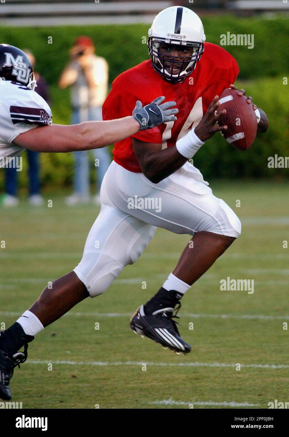 Mississippi State quarterback Omarr Conner scrambles under defensive ...