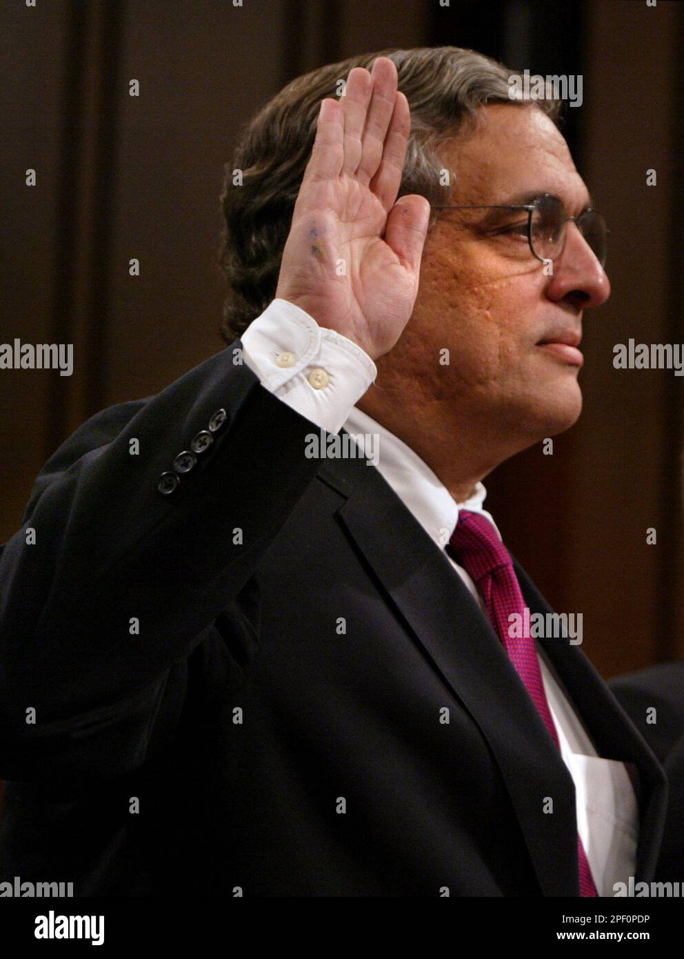 CIA director George Tenet swears in before the commission investigating ...