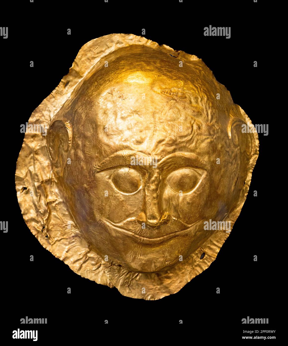 A 16th Century BC, gold, funerary mask from grave IV of grave circle A ...