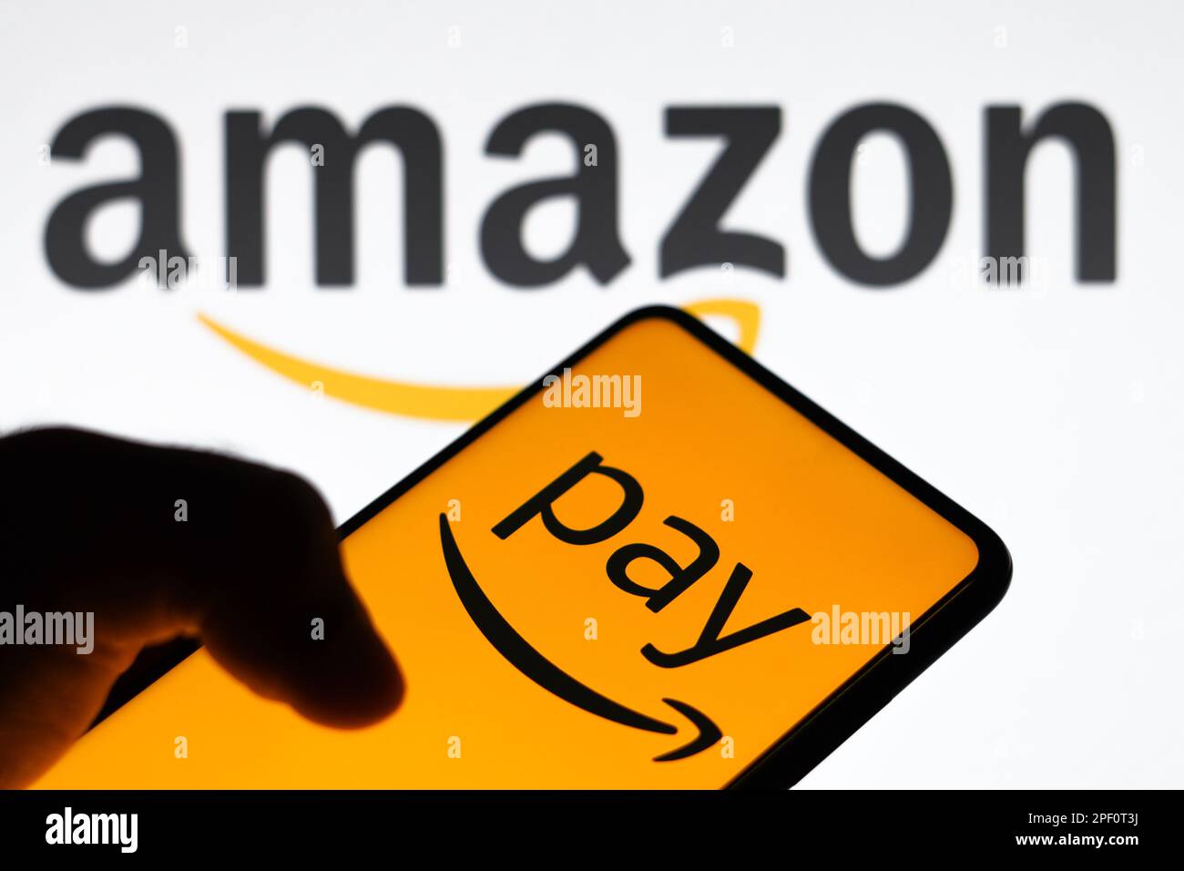 In this photo illustration the Amazon Pay logo seen displayed on a ...
