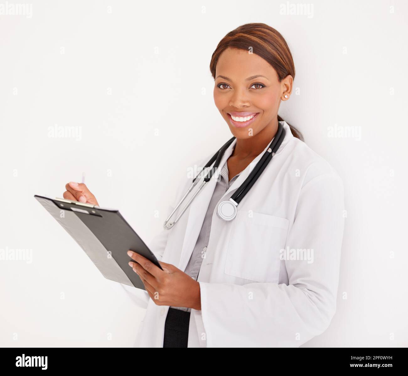 A career in medicine. Portrait of a smiling ethnic woman doctor working ...