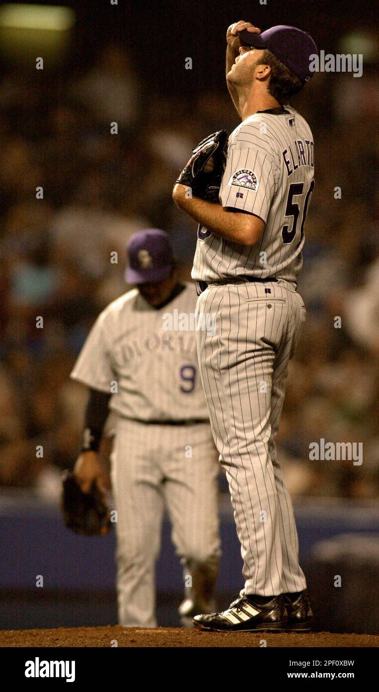 Colorado Rockies pitcher Scott Elarton reacts after giving up a two-run ...