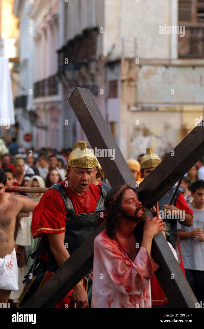 Jose Maldonado, 24, portraying Jesus Christ is whipped by Carlos ...