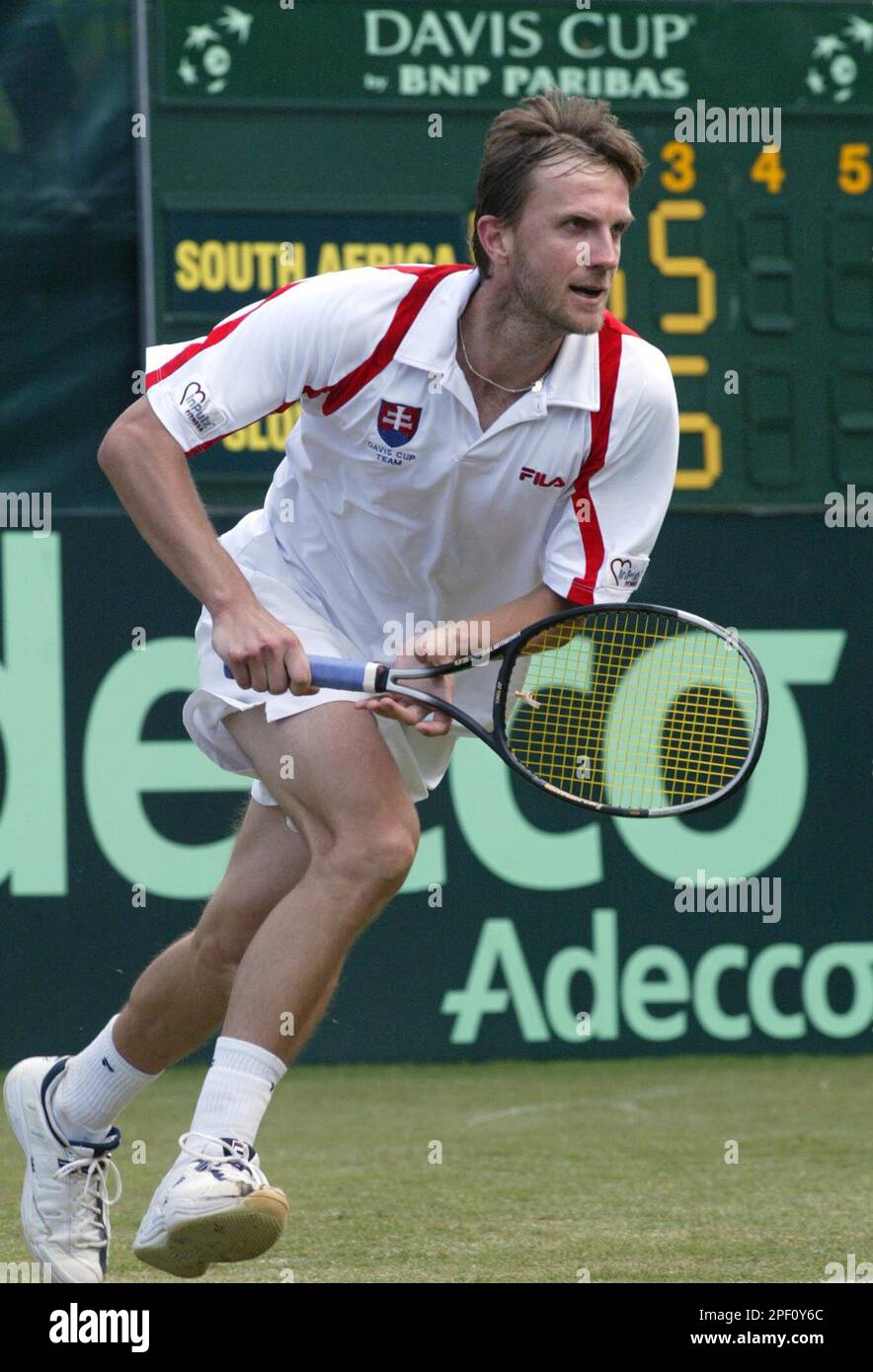 Slovakian tennis player Karol Kucera, runs towards the net during the ...