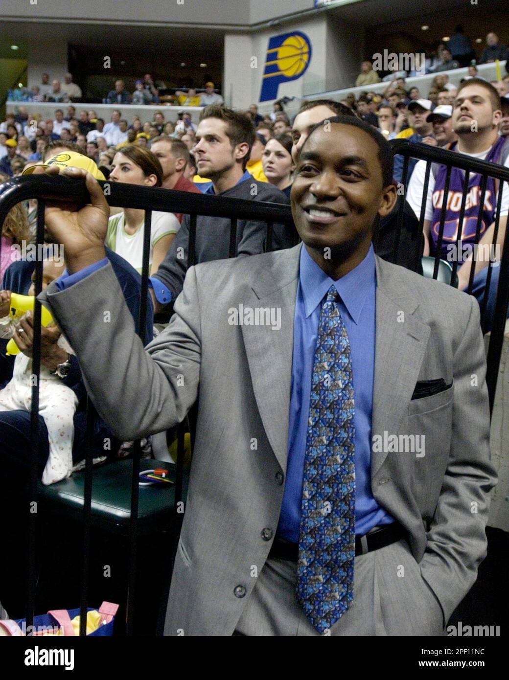 New York Knicks general manager Isiah Thomas watches the first quarter ...