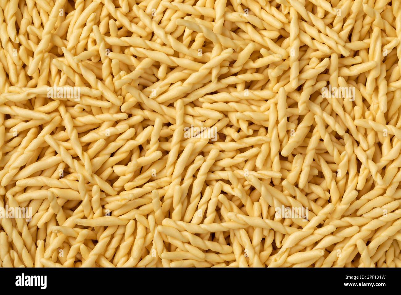 Dried Italian trofie pasta, short, thin, twisted pasta from Liguria ...