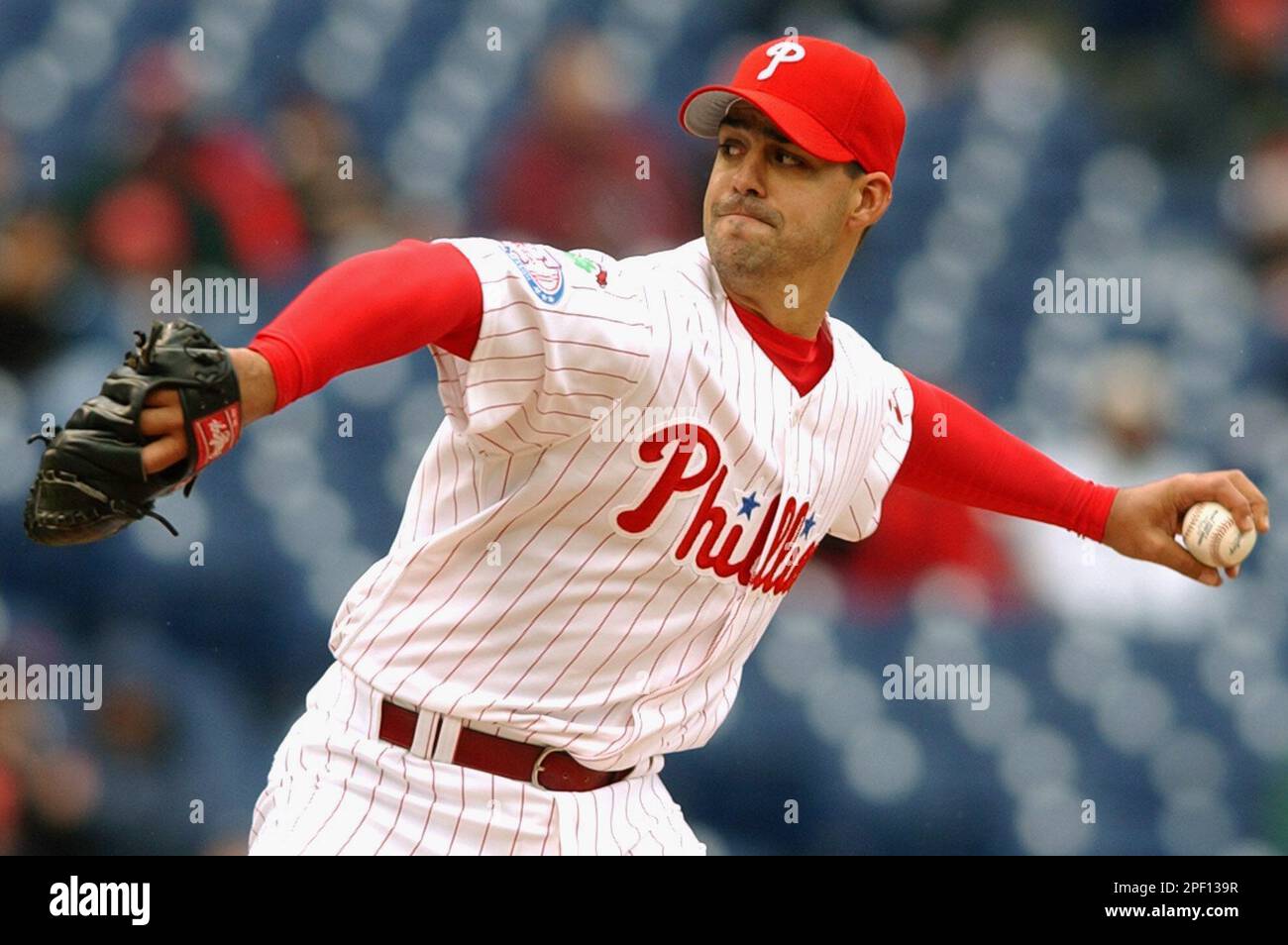 Philadelphia Phillies pitcher Eric Milton delivers in the first inning ...