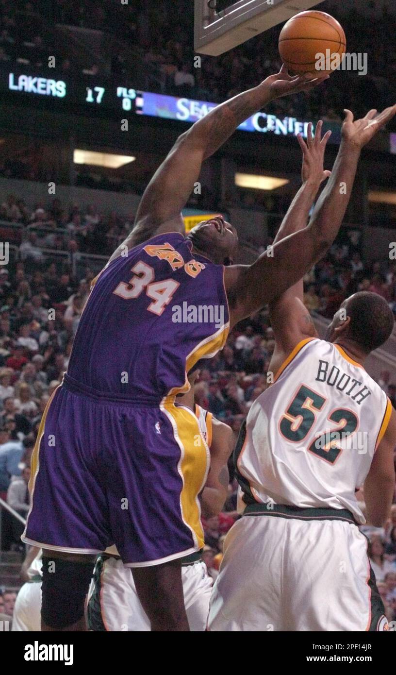 Los Angeles Lakers' Shaquille O'Neal, left, scores over Seattle ...