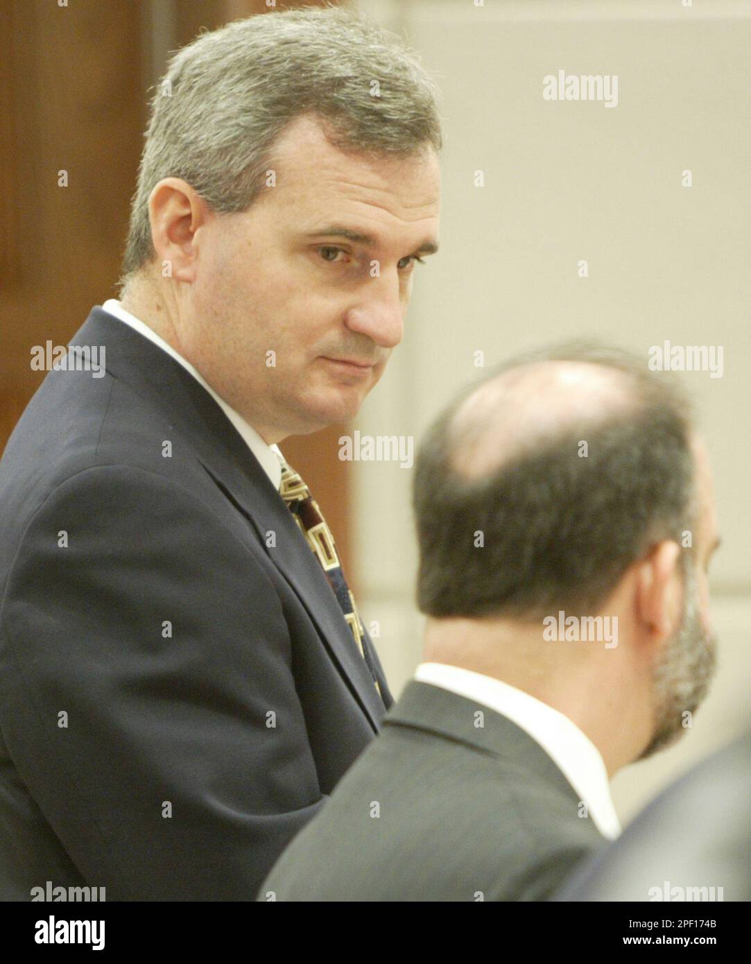 Michael Blagg listens to his attorney Ken Singer during his murder ...