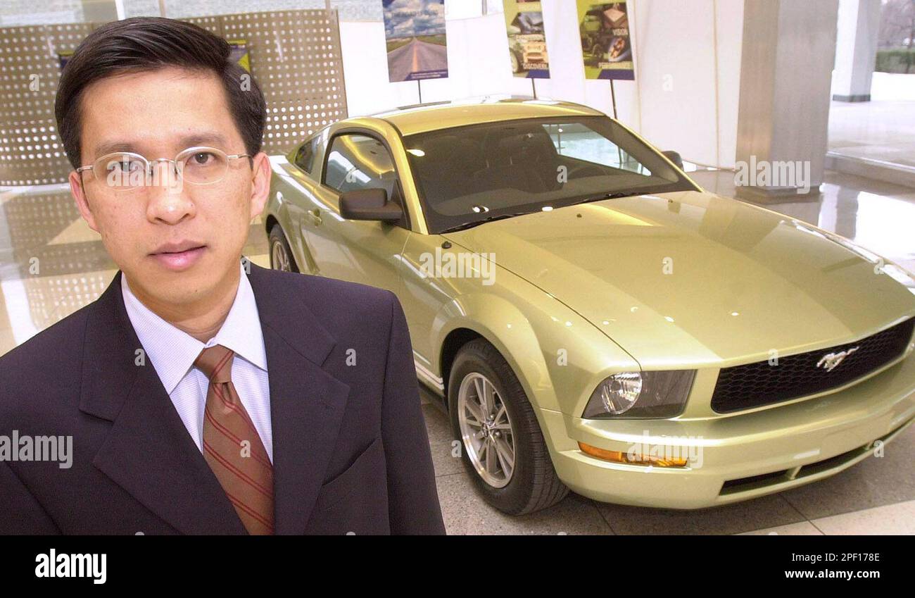 ** ADVANCE FOR SUNDAY, APRIL 4 ** Hau Thai-Tang stands next to a Ford ...