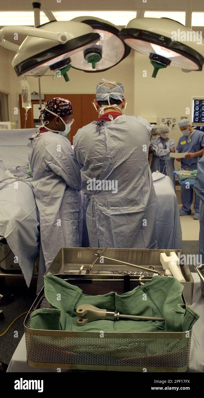 The Repiphysis expandable implant sits in a tray, bottom of photo, as ...