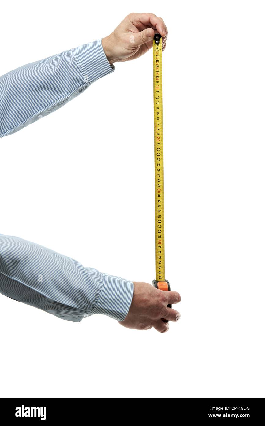 Businessman's hands using a measuring tape, isolated on white ...