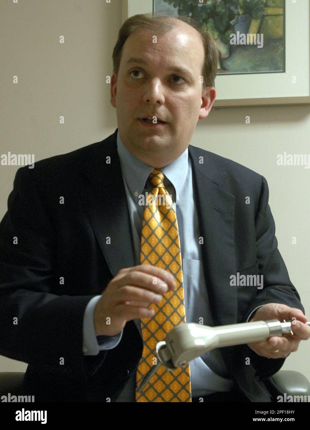 Dr. Alan Yasko displays an expandable implant on Tuesday, March 30 ...