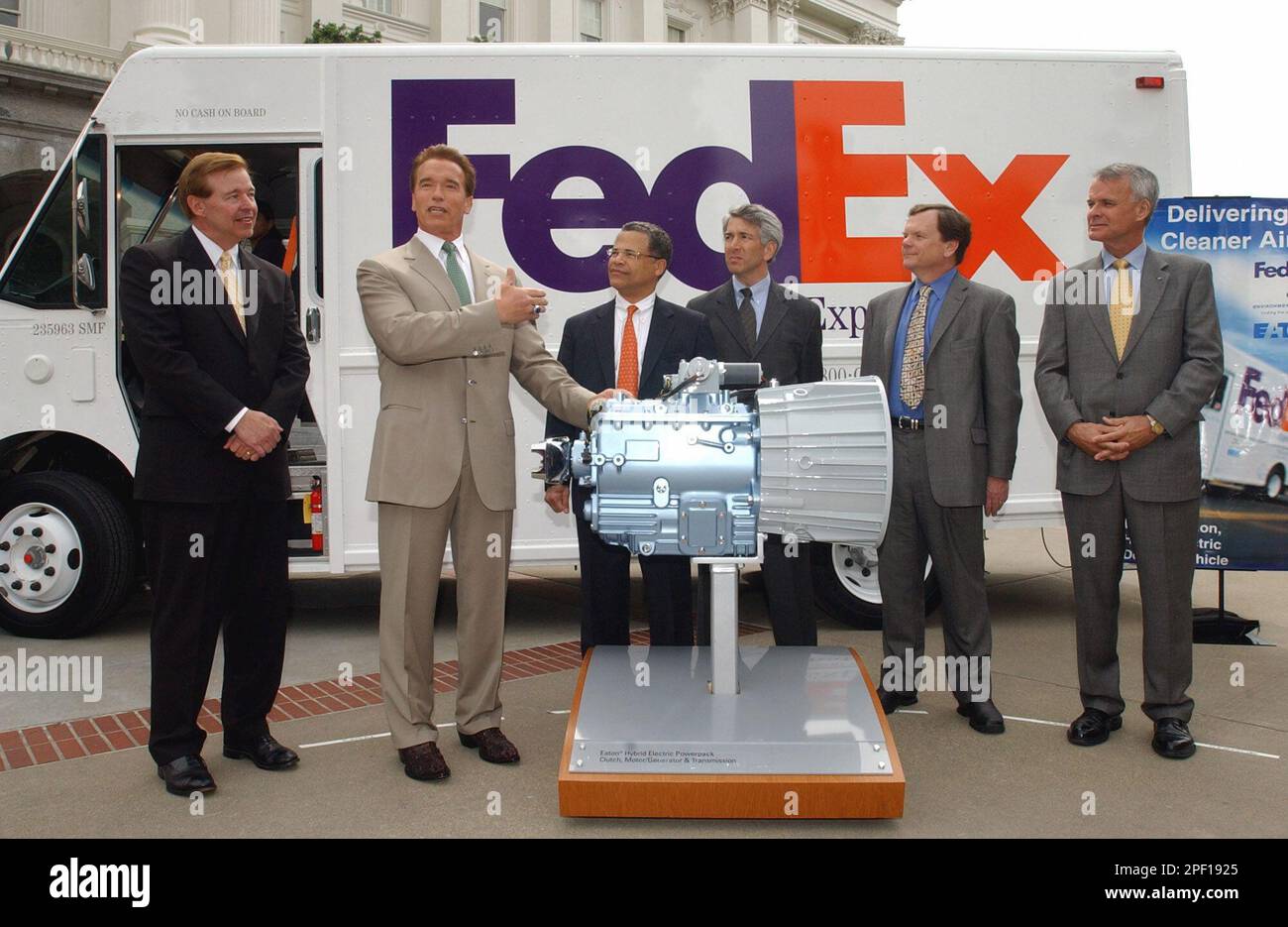 Gov. Arnold Schwarzenegger, second from left, talks about the new low ...