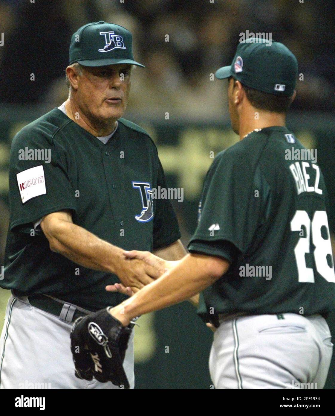 Tampa Bay Devil Rays manager Lou Piniella welcomes reliever Danys Baez ...