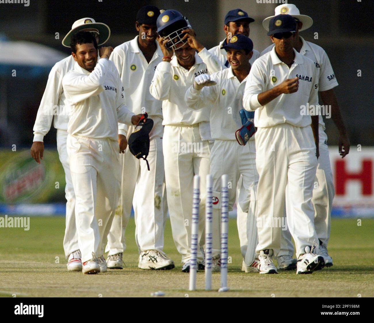 India cricket players celebrate a dismissal of Pakistan's Moin Khan ...