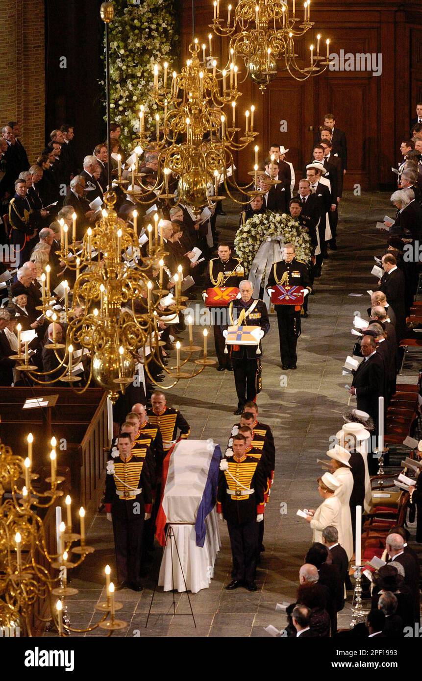 Royal guards stand next to the coffin during the funeral service for ...