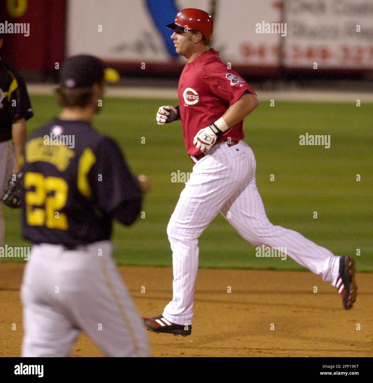 Cincinnati Reds' Adam Dunn trots past Pittsburgh Pirates pitcher Ryan ...