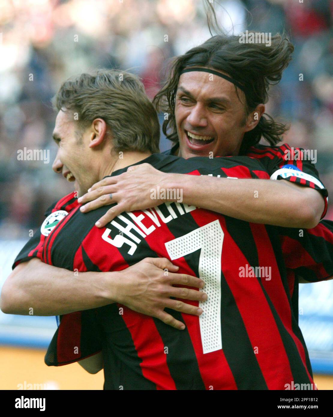 AC Milan's Andriy Shevchenko, left, of Ukraine, is hugged by his ...