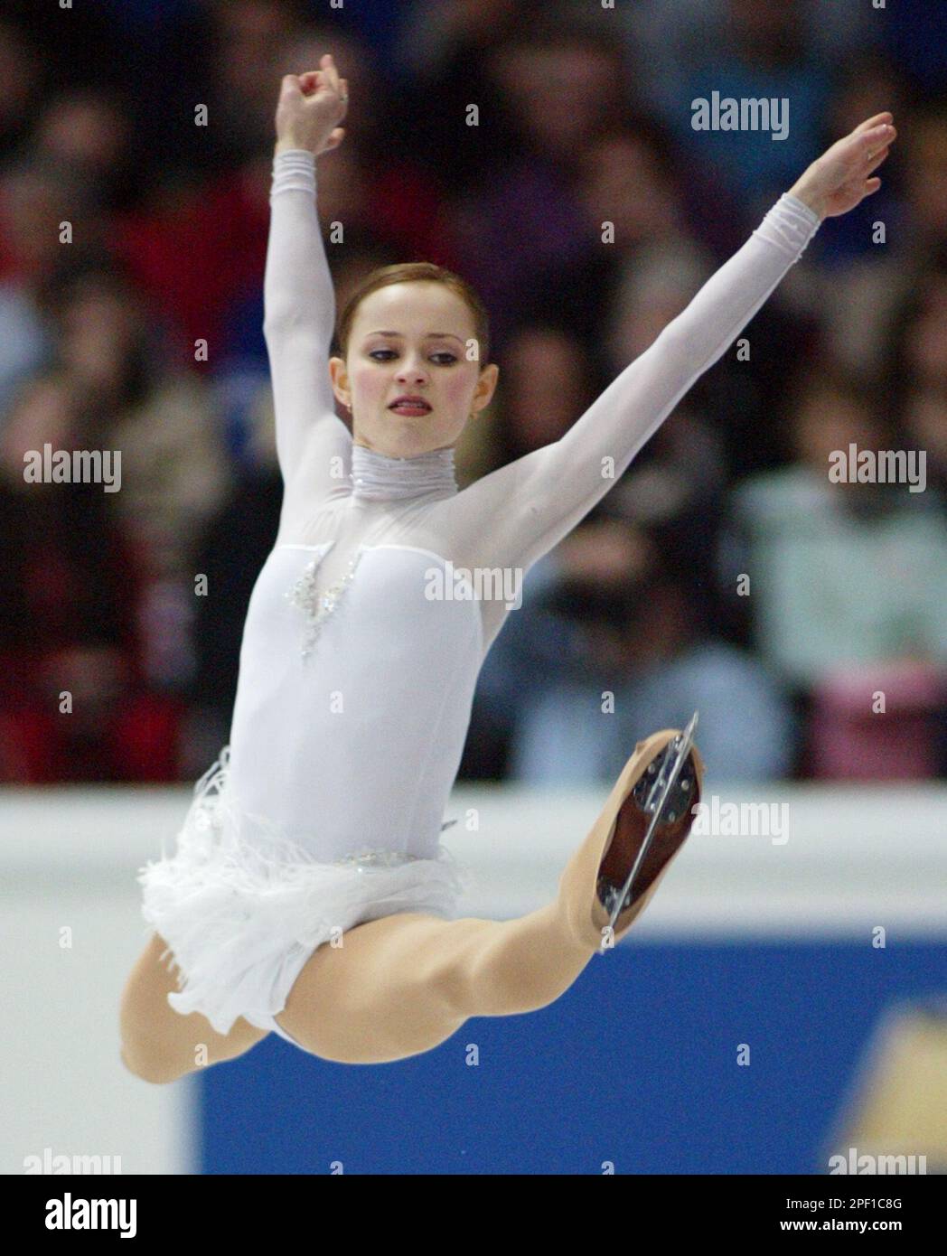 Sasha Cohen from the US jumps during her free program to win the silver ...