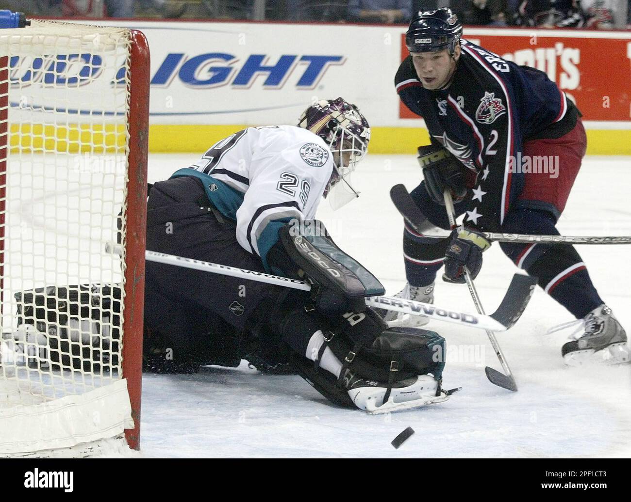 Columbus Blue Jackets' Anders Eriksson, right, of Sweden watches ...