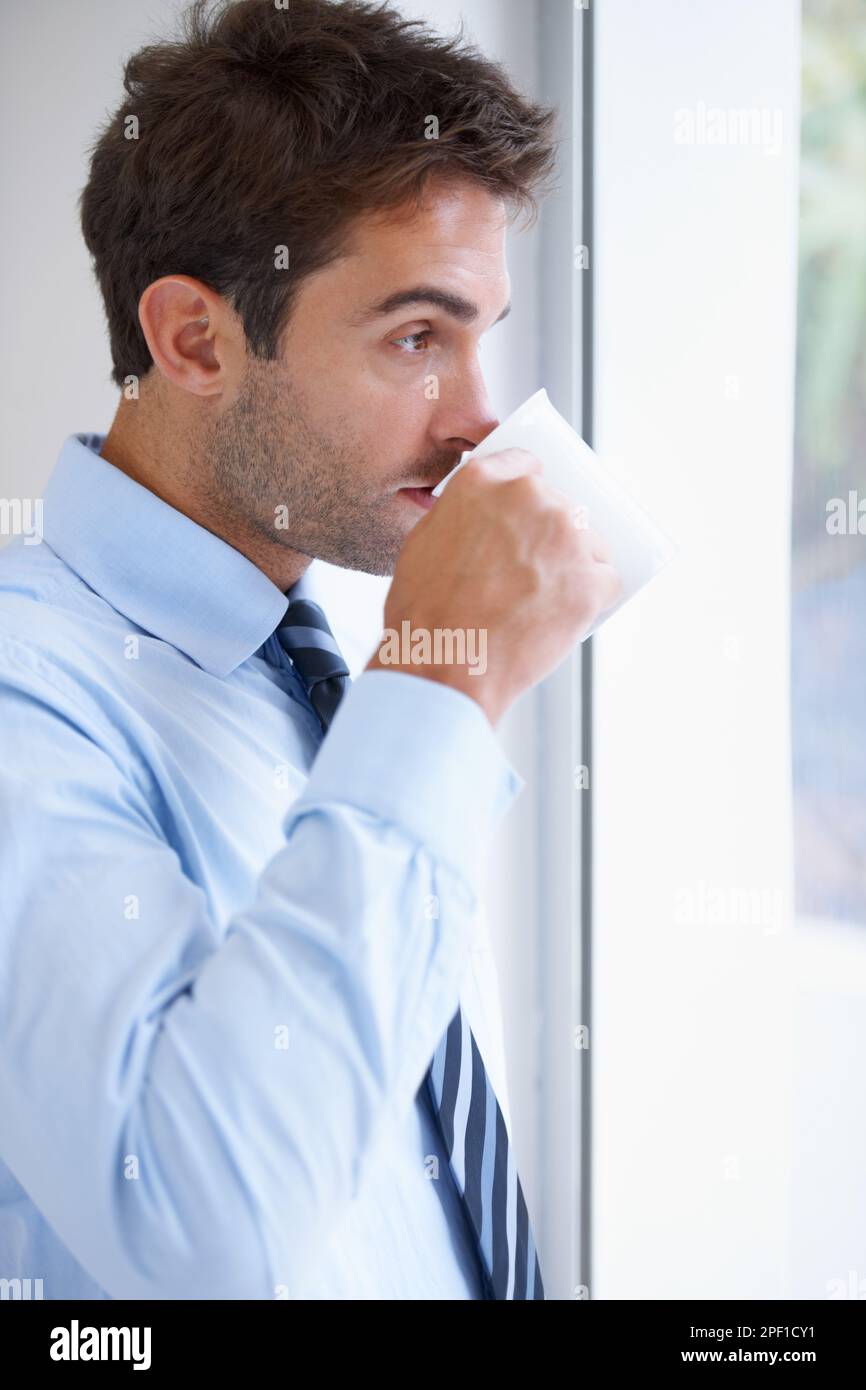 The modern professional. a handsome young businessman at work Stock ...