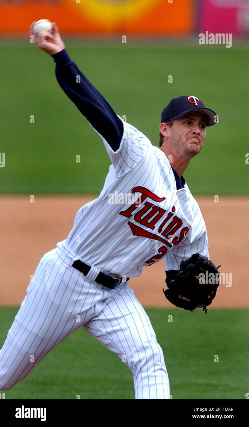 Minnesota Twins starting pitcher Brad Radke delivers a throw against ...